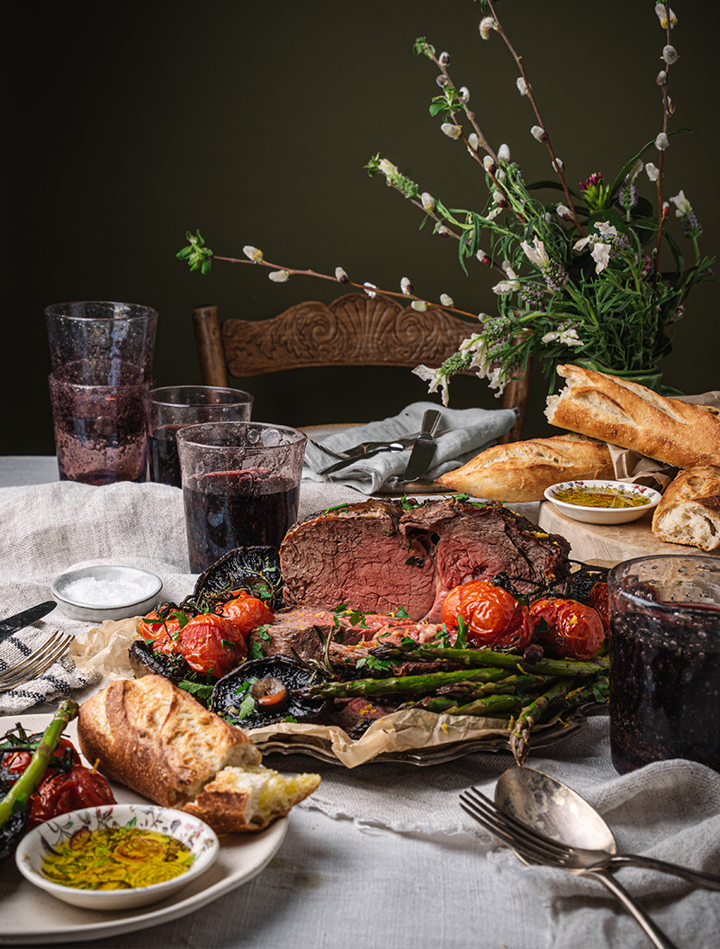 Half Rib Eye (Scotch Steak) with slow roasted mushrooms, vine ripened tomatoes and asparagus ...